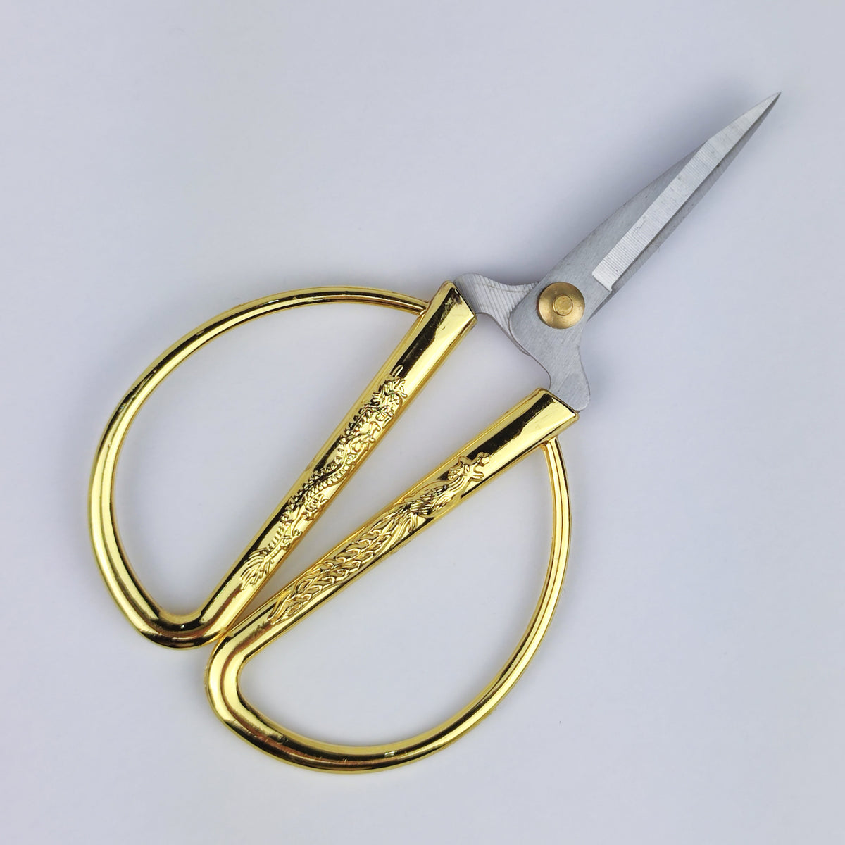 Tijera dorada chica – inkper